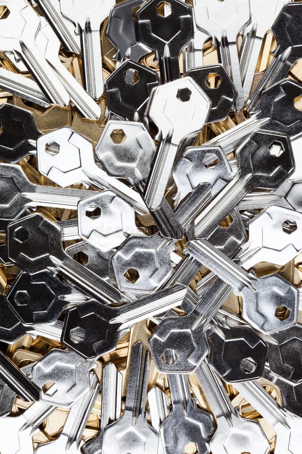Silver-gold Colored Key Blanks. Stock Image - Image of explosion, close ...