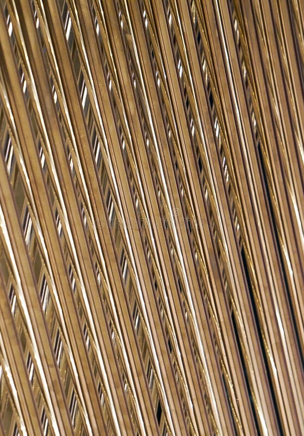 Silver and Gold Rods in a Vertical Pattern Stock Image - Image of ...