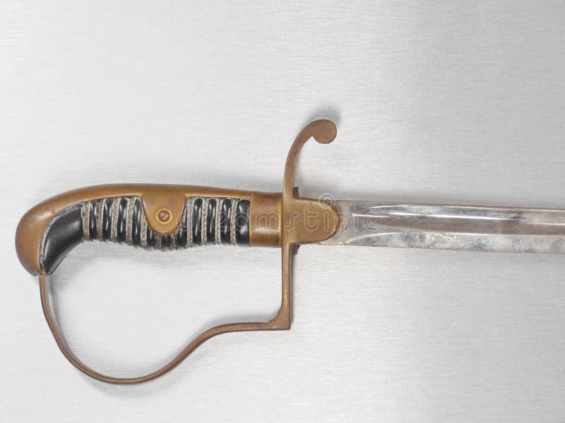 A Silver and Gold Sword with a Black Handle Stock Photo - Image of iron ...