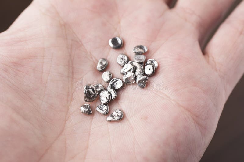 Silver Granular Zinc on Hand. Rose Alloy for Soldering Stock Image ...