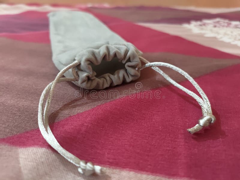 Silver Grey Colour Long Cloth Pouch with Shining Strapsh Stock Image ...