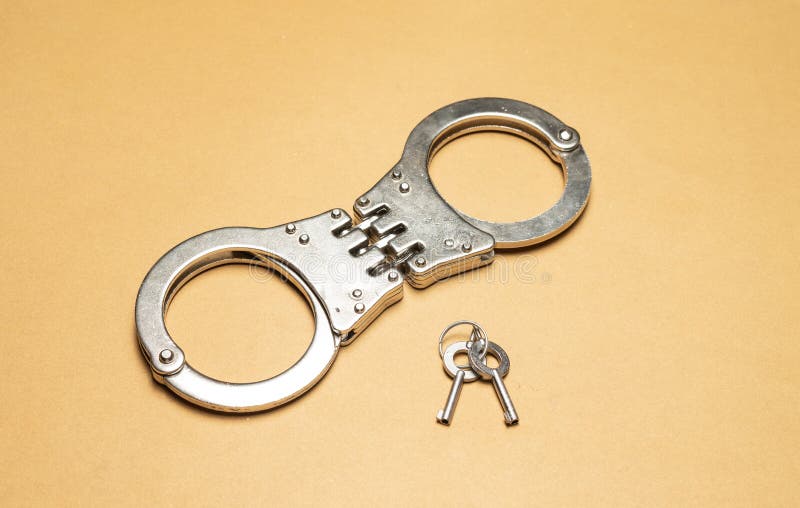 Silver Handcuff with Keys - Law and Justice Concept Stock Photo - Image ...
