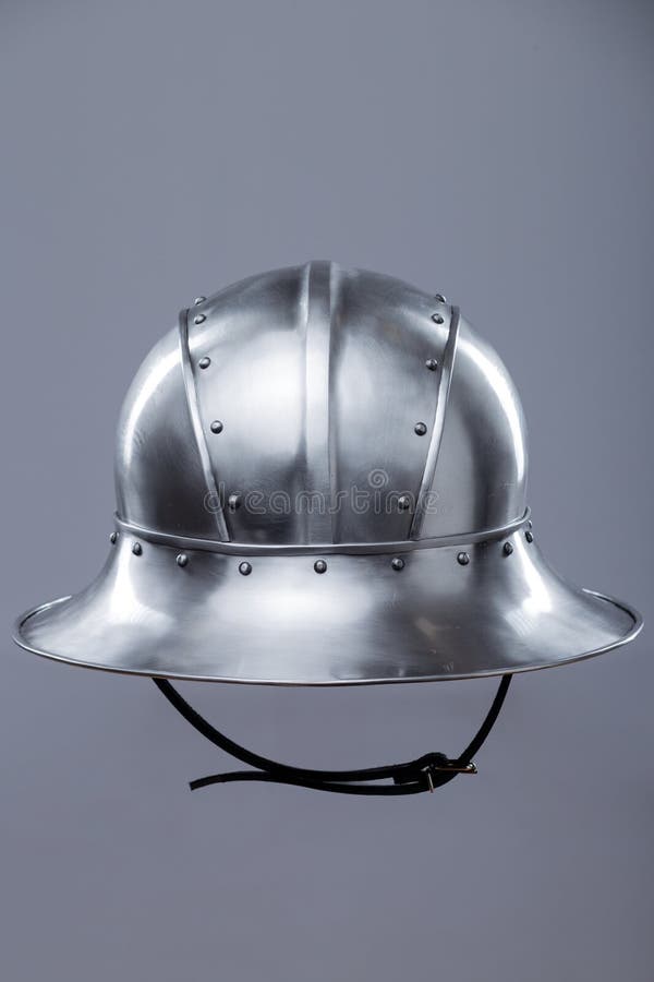 Silver Helmet with Wide Brim and Rivets. this Image Shows a Shiny ...