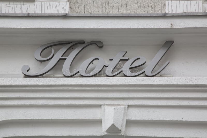 Silver Hotel Sign on Building Stock Photo - Image of building, journey ...
