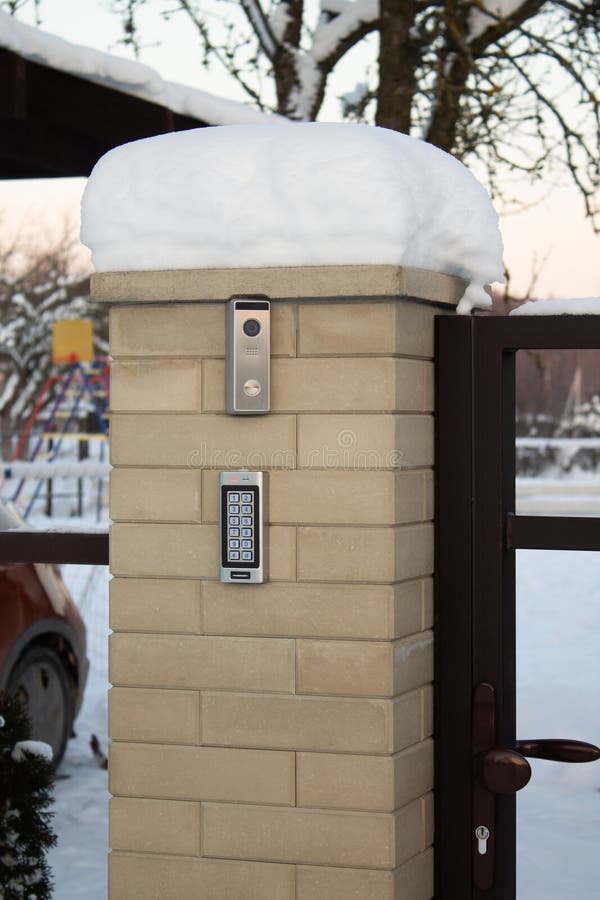 Silver Intercom Call Panel with Blue Number Buttons and a Video Camera ...