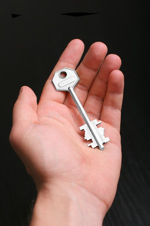 Silver key in hand stock photo. Image of achievement, fist - 2966748