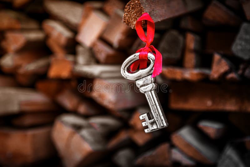 Silver key with red ribbon stock image. Image of close - 70930739