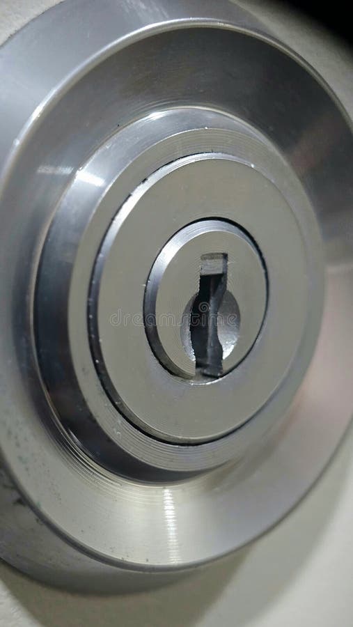 Silver Keyhole of a Safety Deposit Box Stock Photo - Image of metallic ...