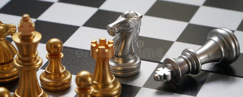 A Silver Knight Stands Over a Fallen Silver King in a Chess Game Stock ...