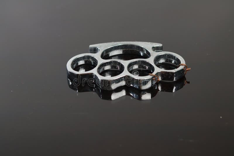 Silver Knuckle on the Glass Table Stock Image - Image of number, black ...