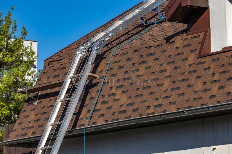 Silver Ladder on the Roof of the Building Stock Image - Image of metal ...