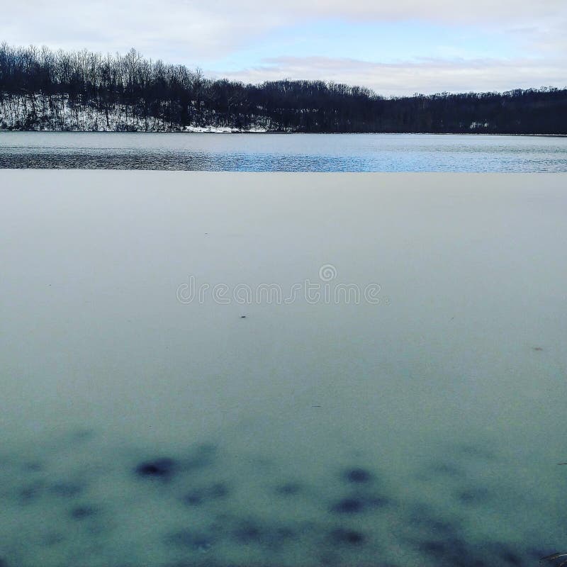 Silver Lake Freezing Over stock image. Image of reflection - 207151831