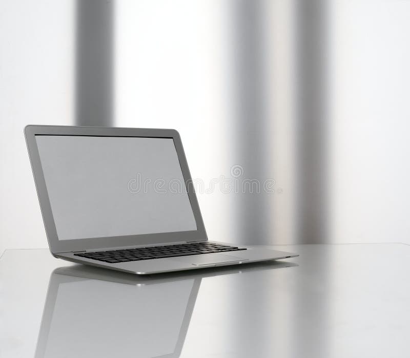 New Silver Laptop in Aluminum Isolated on White. Stock Photo - Image of ...