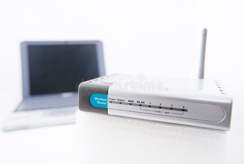 Silver Laptop and Wireless Router Stock Photo - Image of explore ...