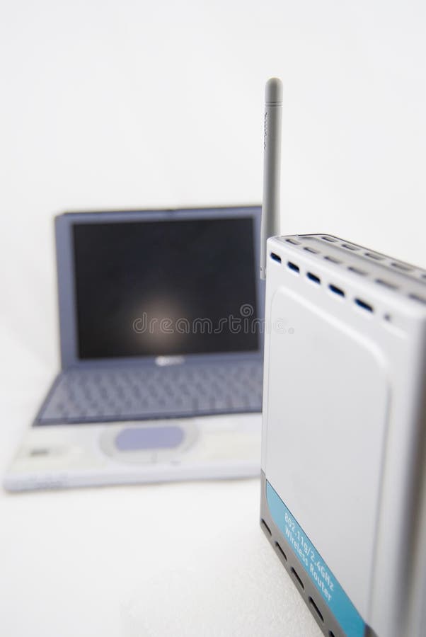 Silver Laptop and Wireless Router Stock Image - Image of wireless, work ...