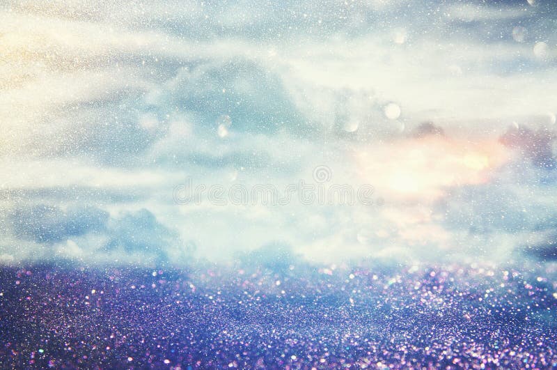 Silver and Light Blue Glitter Lights Background. Defocused. Stock Photo ...