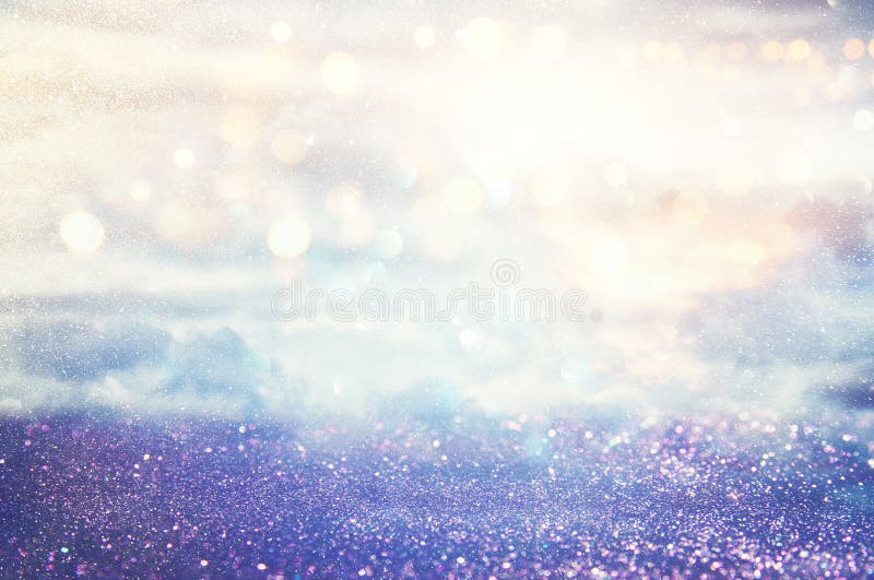 Silver and Light Blue Glitter Lights Background. Defocused. Stock Photo ...