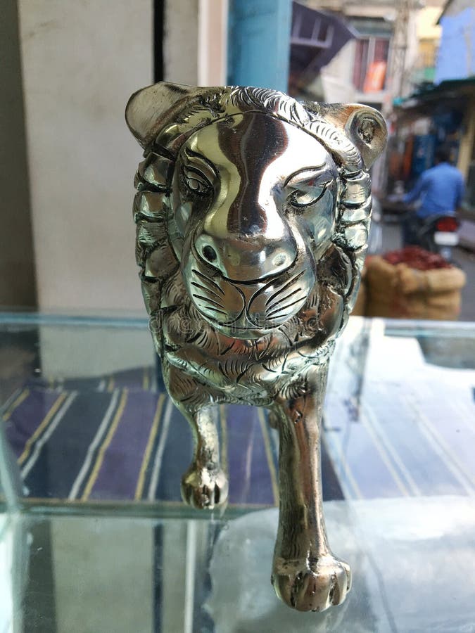 Silver lion statue stock photo. Image of lion, metal - 152391738