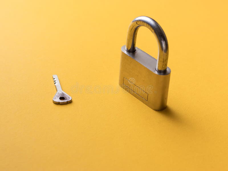 Silver Lock and Key Lying on the Blue Passport Stock Image - Image of ...