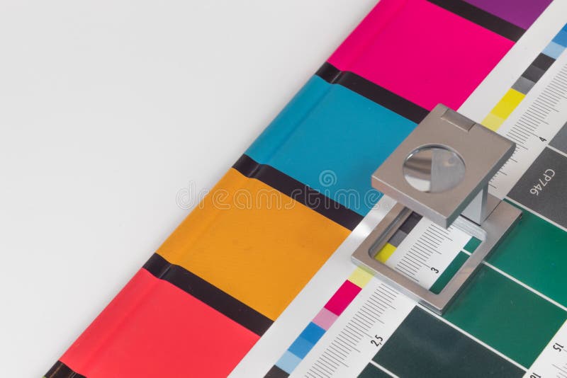 Silver Magnifying Glass Standing on the Test Print, Colored Background ...