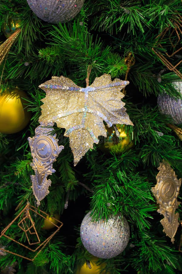 Silver Maple Leaf on a Christmas Tree Stock Image - Image of star ...
