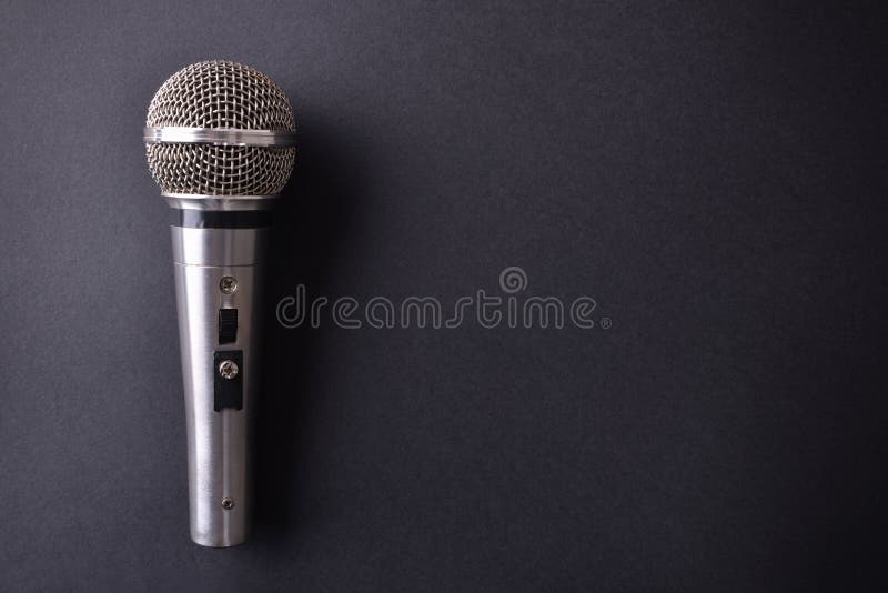 Silver Metal Microphone on Black Table Top View Stock Image - Image of ...