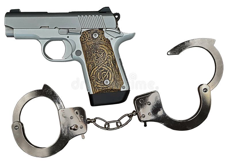 Silver Gun and Handcuffs stock image. Image of jail - 340279613