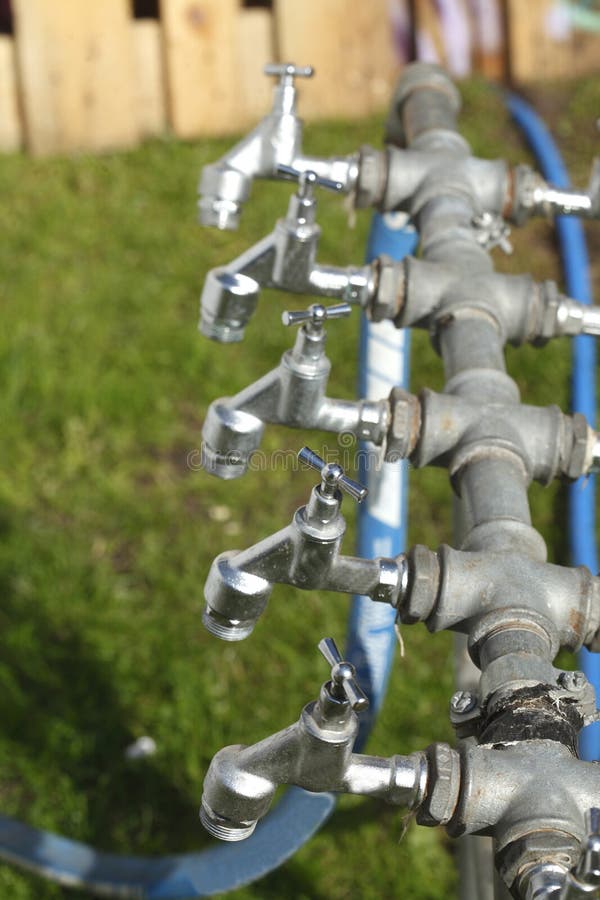 Silver Metal Outside Water Taps Stock Image - Image of pole, taps: 97161877