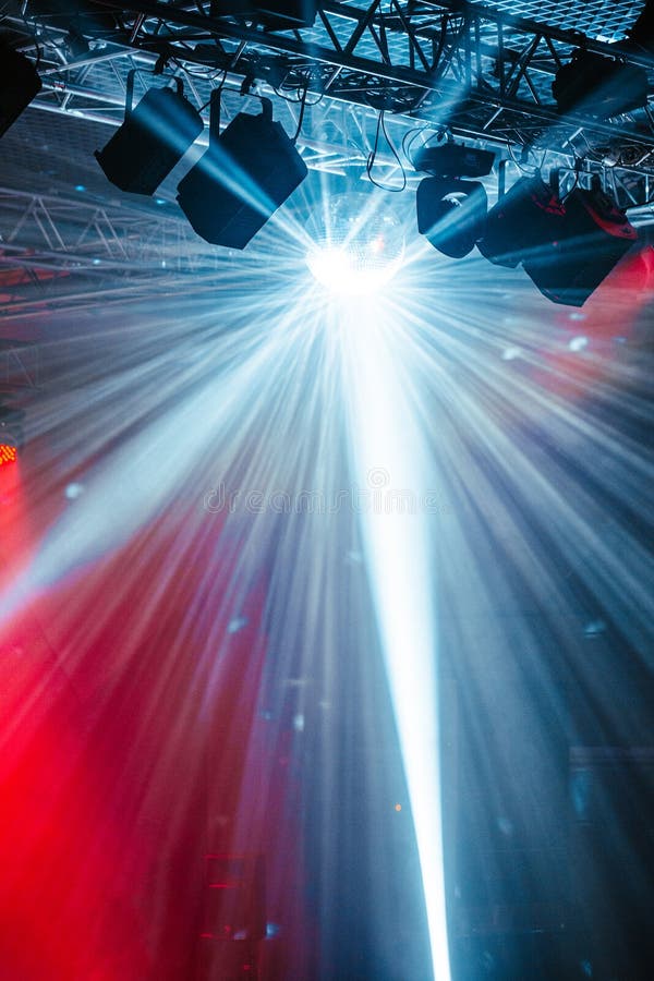 Silver Mirror Disco Ball in Rays of the Spotlights. Stage Lights ...