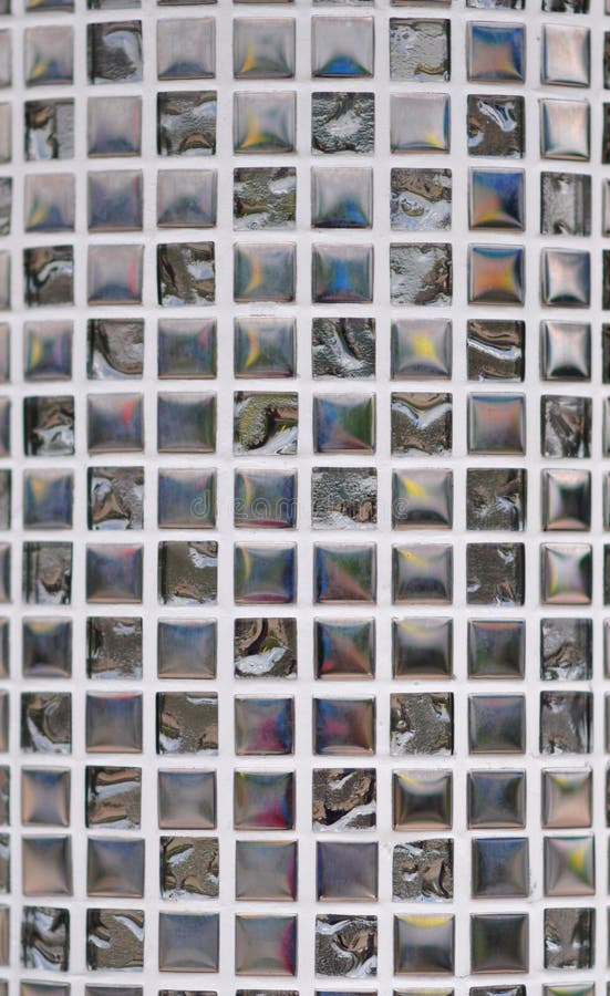 Silver Mosaic Pattern of Tiles.Wall is Decorated with Stained Glass ...