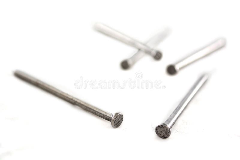 Silver nails on white. stock image. Image of iron, silver - 81607219