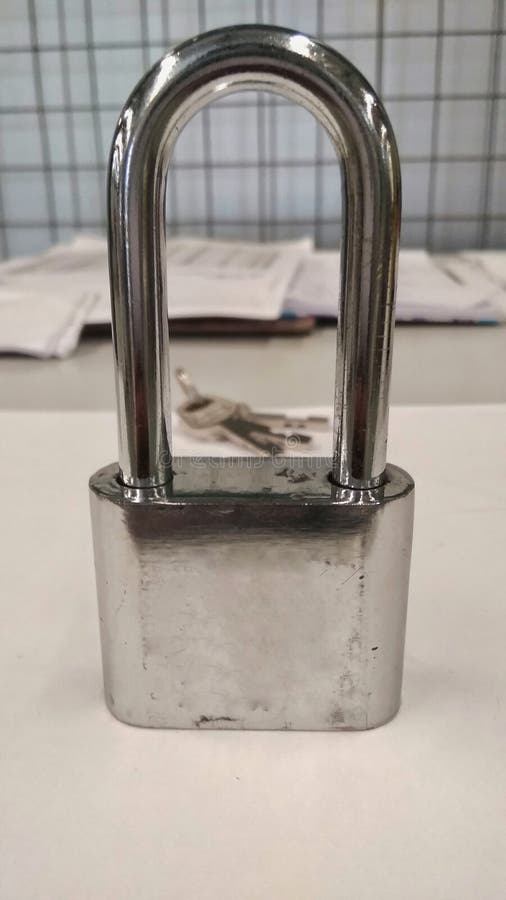 Silver padlock with key stock image. Image of furniture - 228737725