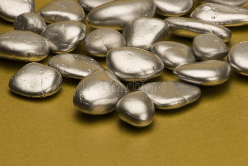 Silver painted stones stock image. Image of closeups, pebble - 1650723