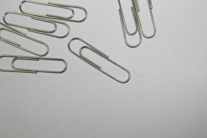 Silver Paper Clips Isolated on White Background Stock Image - Image of ...