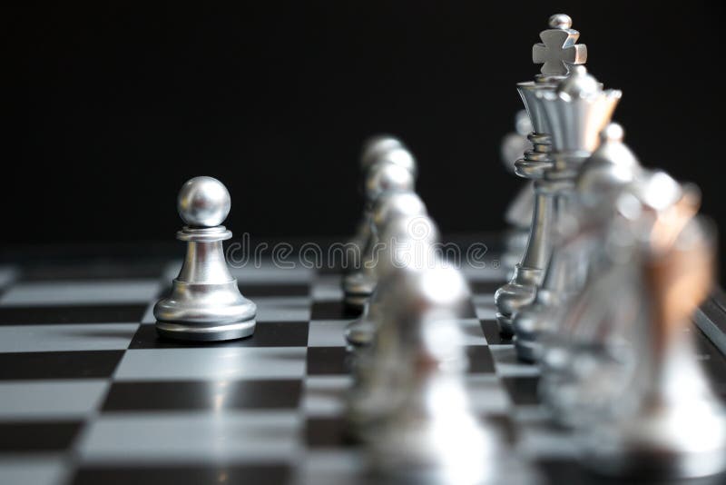 Silver Pawn is on the First Move in Chess Game on Black Background ...