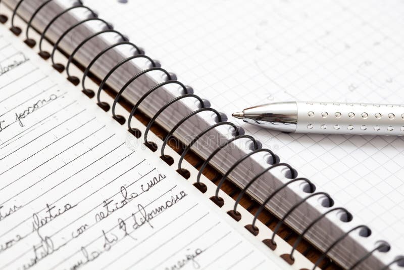 A silver pen on a notebook stock photo. Image of business - 17011018