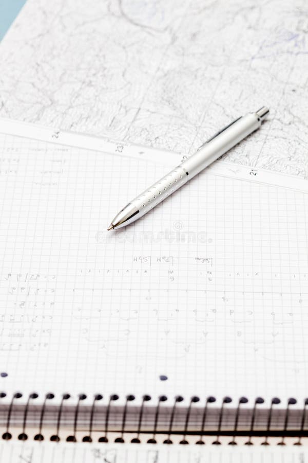 A silver pen on a notebook stock image. Image of note - 17021389