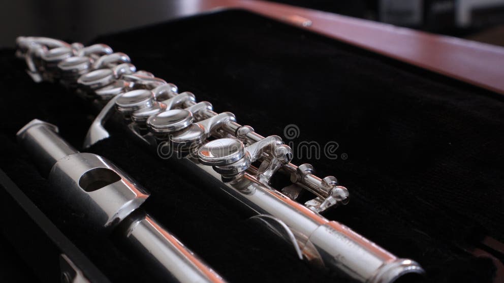 Silver Piccolo stock image. Image of silver, flutes, piccolos - 57888291