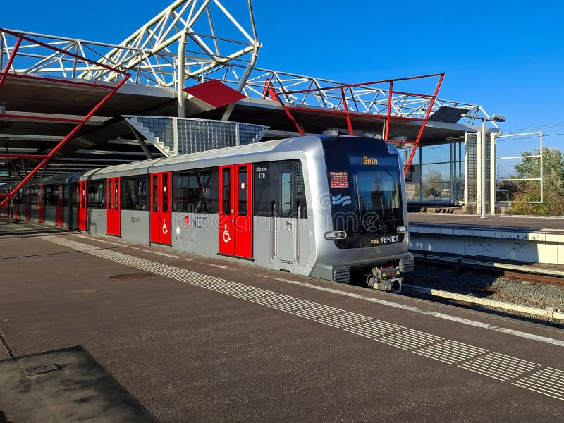 Silver and Red Metro Vehicles of the GVB in Amsterdam Along Platform ...