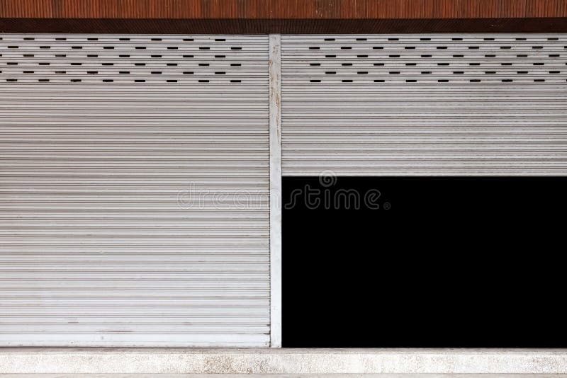 Silver Roller Shutter Door of the Store is Closed and Opened Stock ...