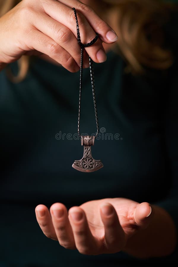Silver Runic Talisman Hammer of Thor in Hand Stock Photo - Image of ...