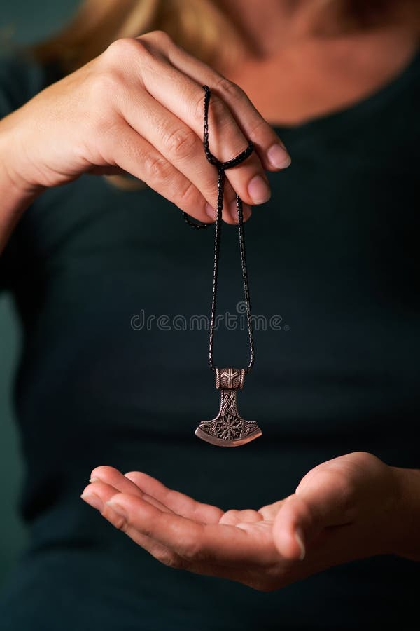 Silver Runic Talisman Hammer of Thor in Hand Stock Photo - Image of ...