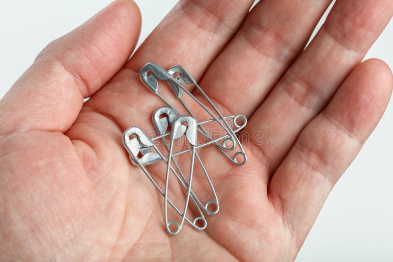 Silver safety pin stock photo. Image of supplies, tool - 96539940