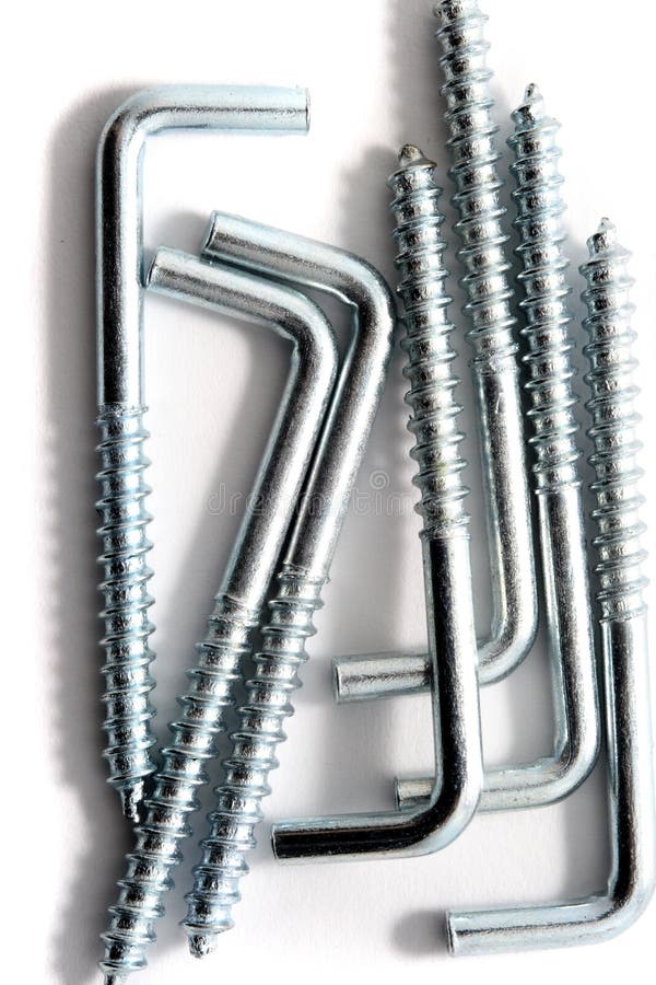 Silver screws in a raw stock image. Image of equipment - 12652745