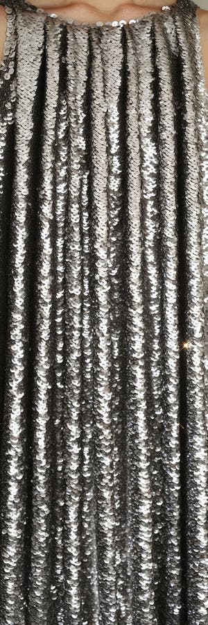Silver Sequined Fabric Reflecting Light with a Sparkling Effect Stock ...