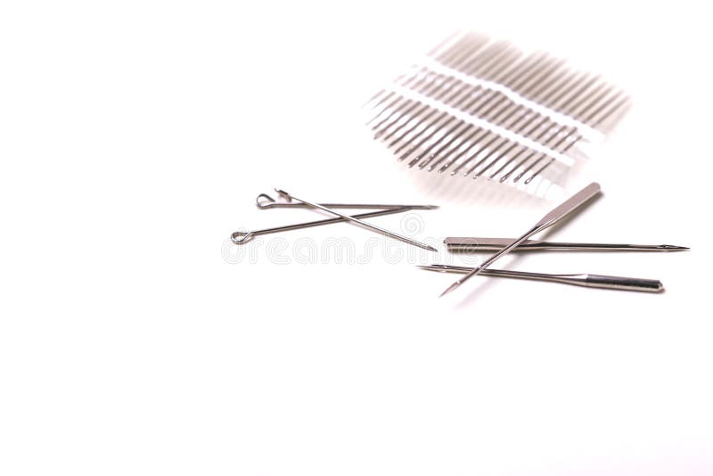 Silver Sewing Pins and Needles on White Background Stock Image - Image ...