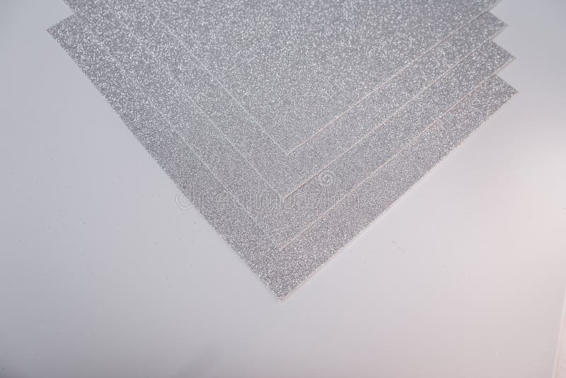 Silver Sheets of Cardboard with Sparkles on a White Background Stock ...