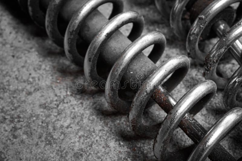 Silver Shock Absorber on Cement Floor. Shock for Motorcycle Stock Image ...