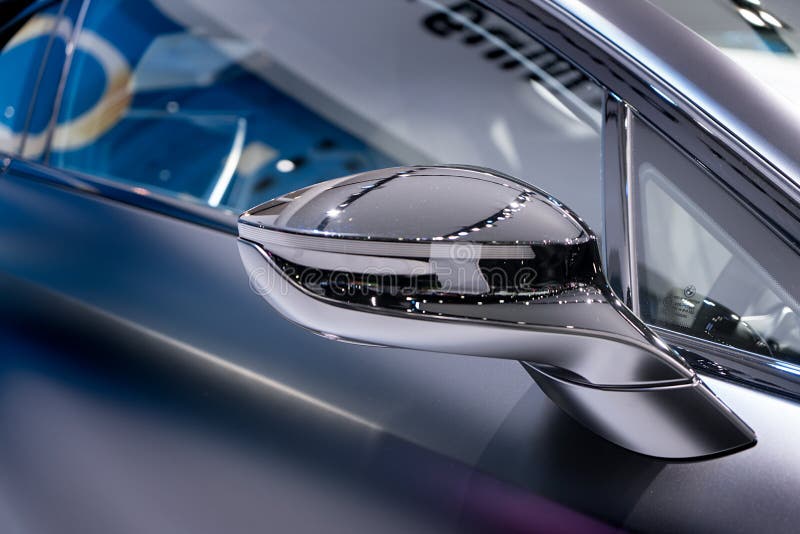 Silver Side View Mirror with Silver Modern Car. Close Up. Stock Image ...