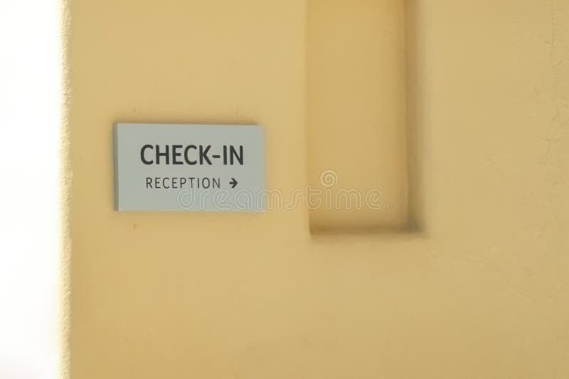 Sign Receptionist Arrow Pointing Across Wall Stock Photos - Free ...